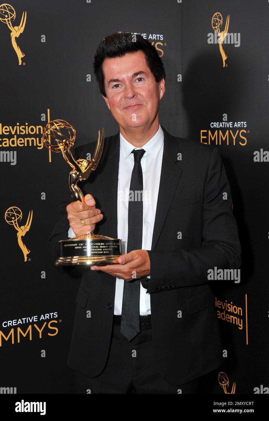 EXCLUSIVE - Simon Fuller poses for a portrait with the Governors Award ...