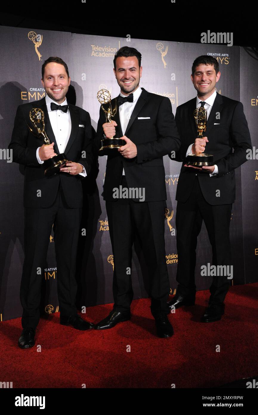 Rob Crabbe, from left, Ben Winston, and Adam Abramson, pose in the ...
