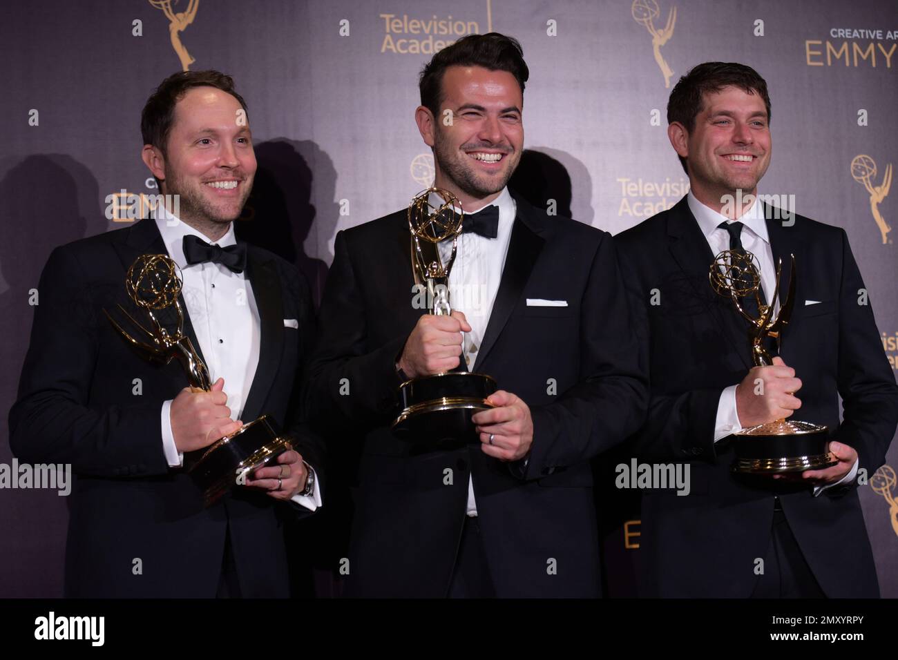 Rob Crabbe, from left, Ben Winston, and Adam Abramson, pose in the ...