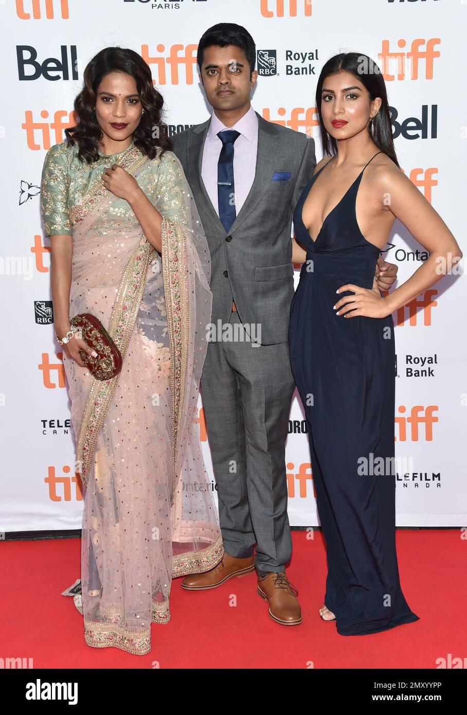 Priyanka Bose, from left, Divian Ladwa and Pallavi Sharda arrive at the ...