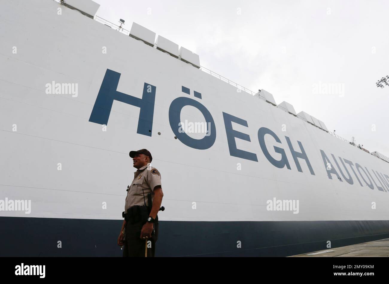 Roger Ponce, a Panama Canal Protection agent, stands by the Norway ...