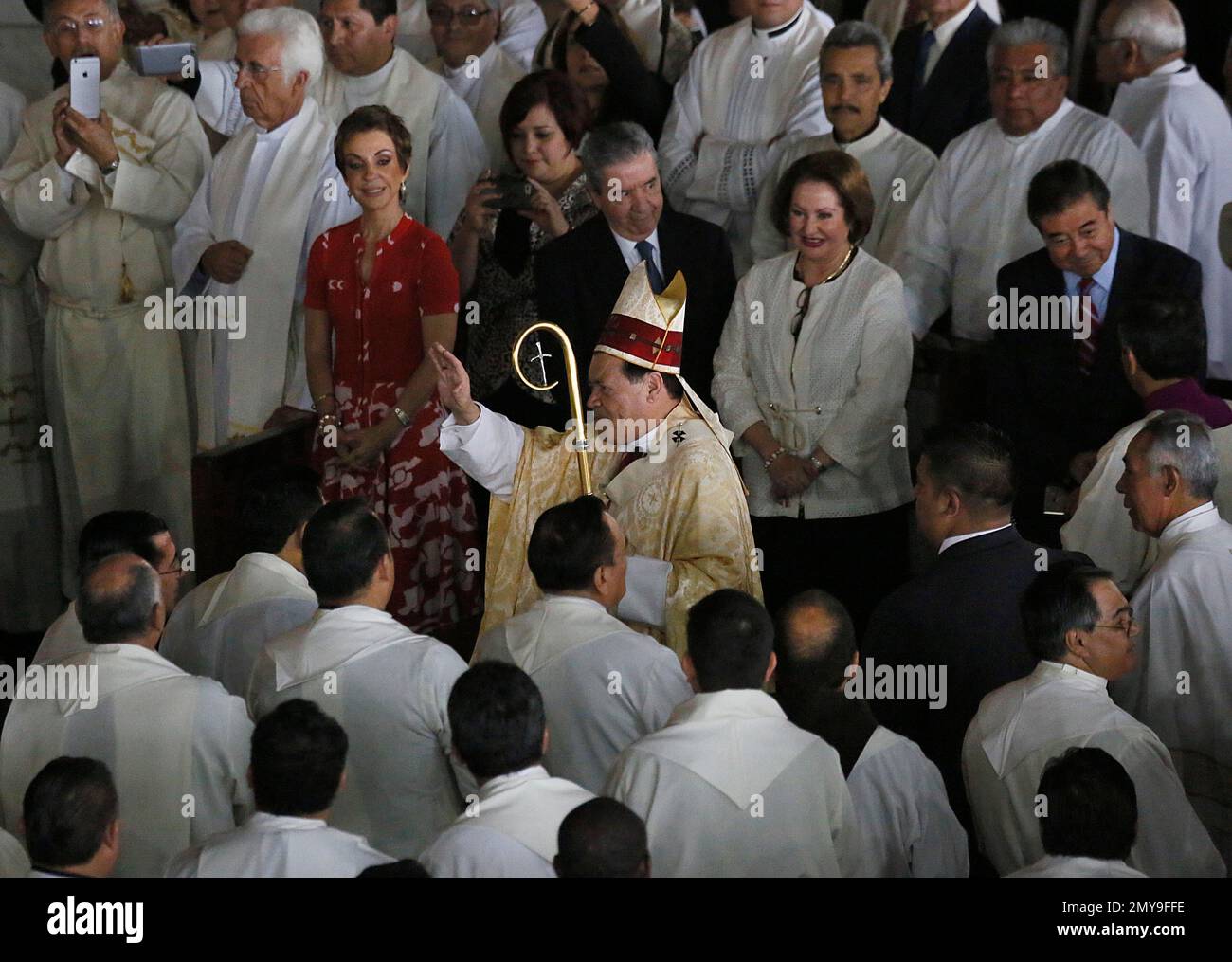 Mexico's Cardinal Norberto Rivera waves as he enters the Basilica of ...