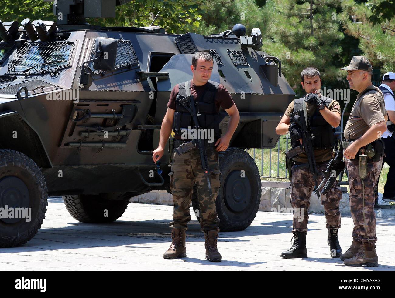 Turkish security officers stand outside a courthouse where prosecutors ...