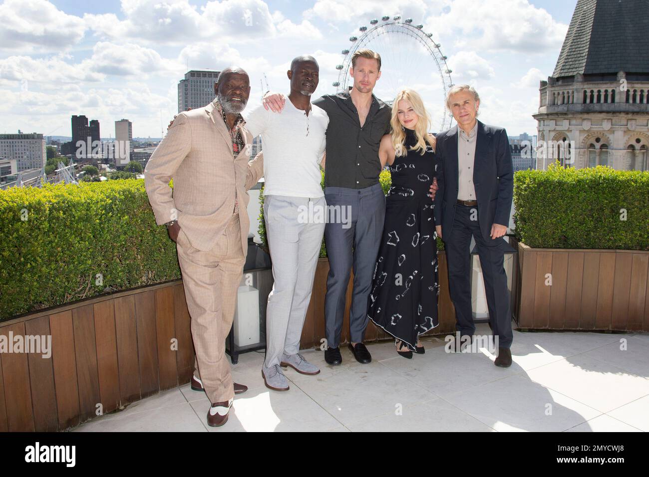 Actors, from left, Yule Masiteng, Djimon Hounsou, Alexander Skarsgard ...