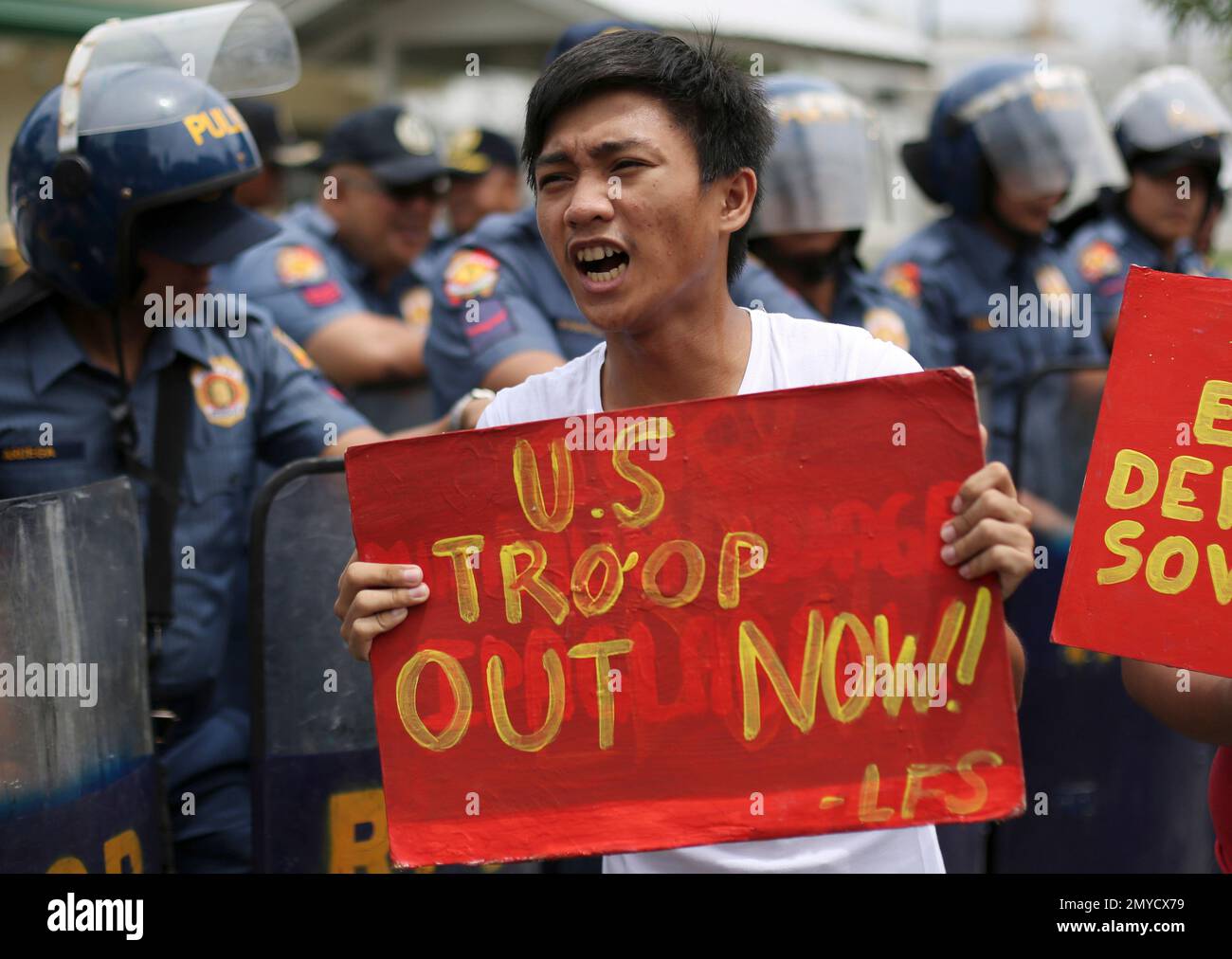 A Filipino student protester shouts slogans during a rally in front of ...