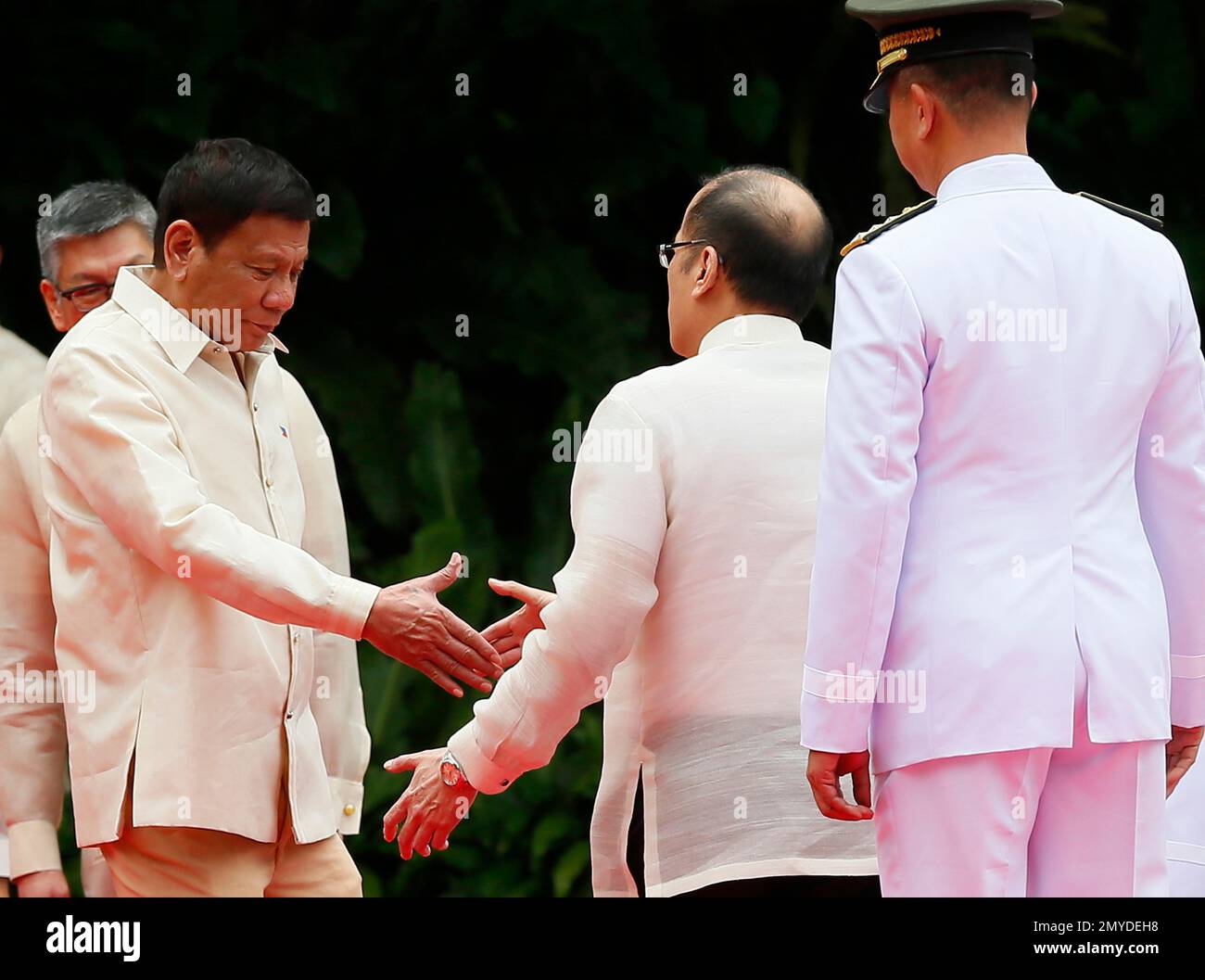 New Philippine President Rodrigo Duterte, left, and outgoing President ...