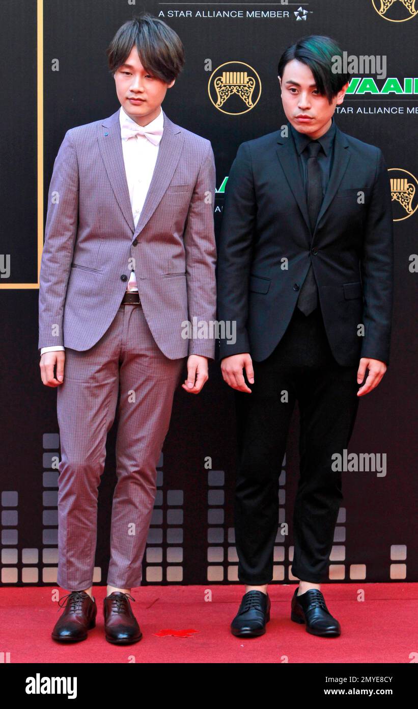 Members of Taiwanese pop group IO Band arrive at the 27th Golden Melody ...