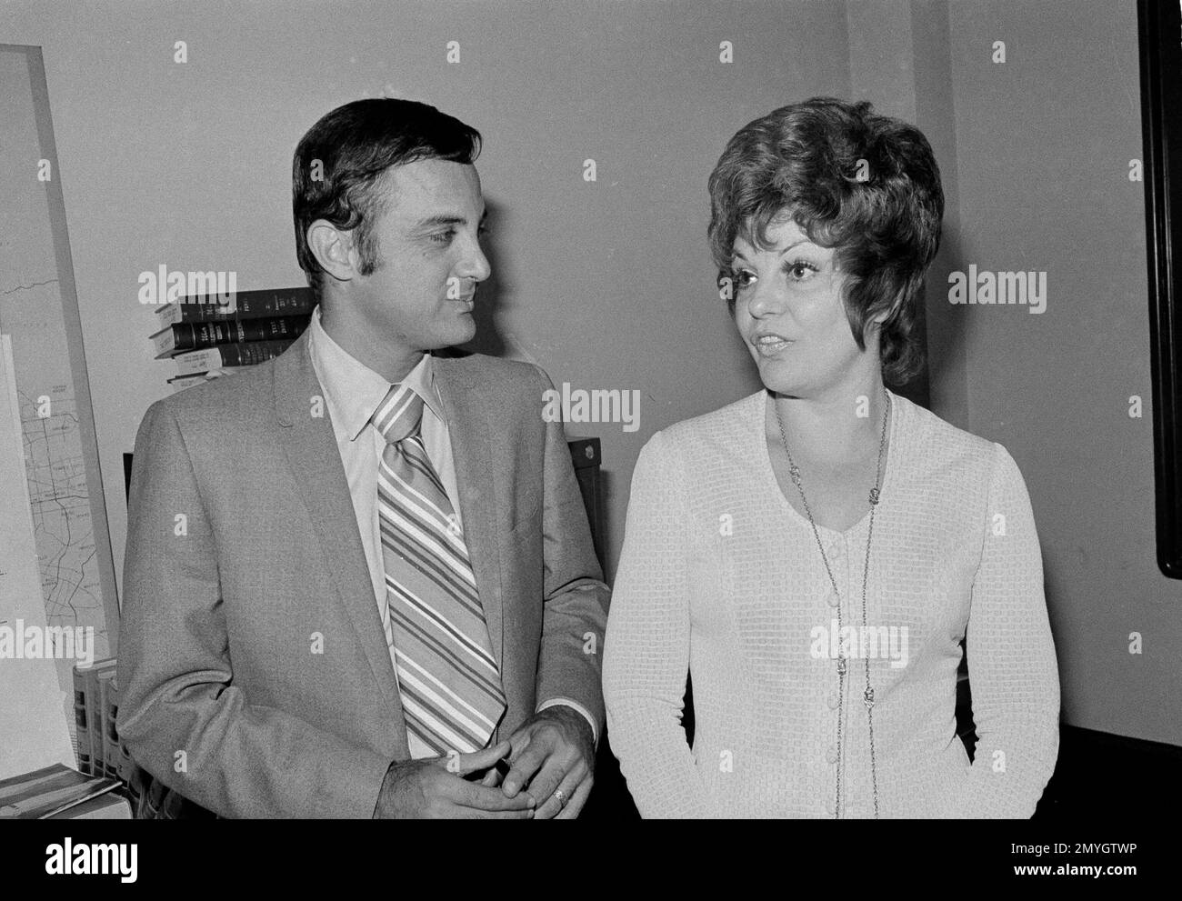 Mrs. Virginia Graham, 37, talks with her attorney, Robert Steinberg, at ...