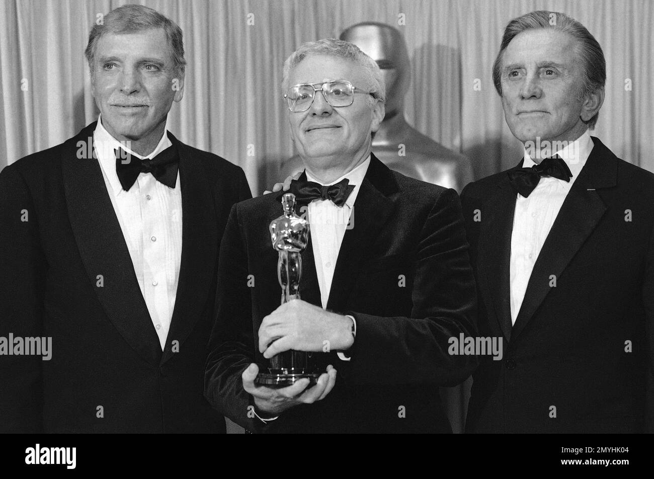 FILE - In this file photo dated March 25, 1985, actors Burt Lancaster, left, and Kirk Douglas ...