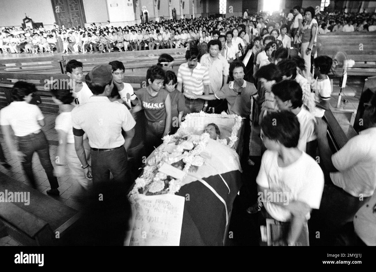 FILE - In this Aug. 30, 1983 file photo, thousands of Filipinos wait in ...