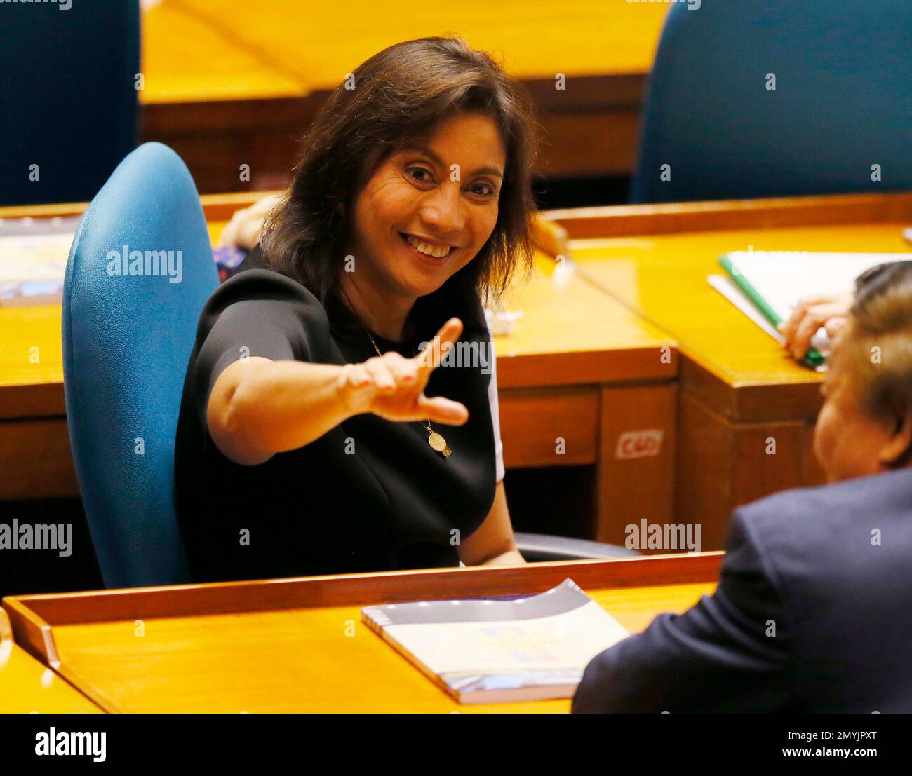 Congresswoman Leni Robredo flashes the "L" sign for "Laban" that means ...