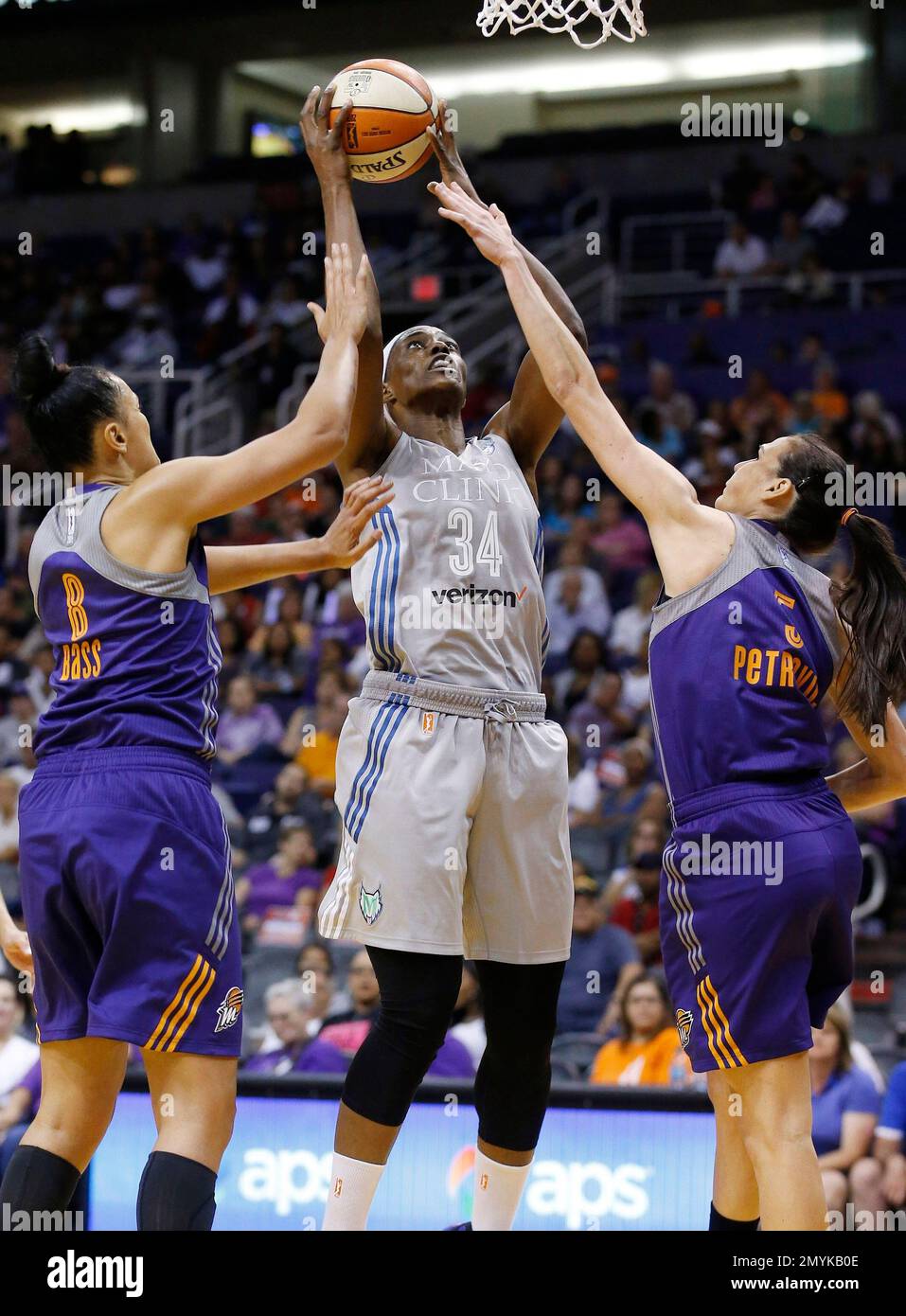 Minnesota Lynx's Sylvia Fowles (34) shoots between Phoenix Mercury's ...