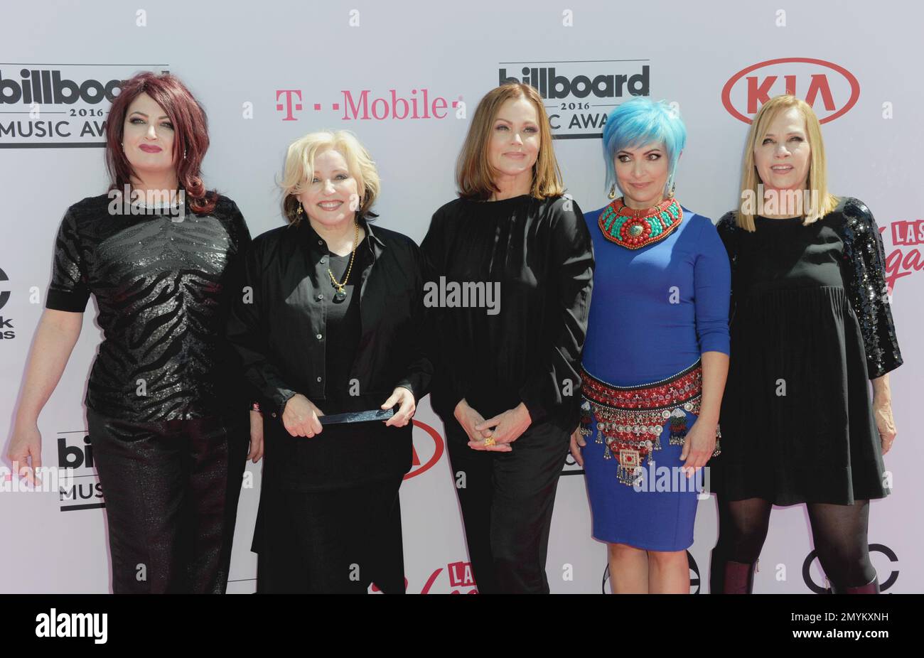Abby Travis, from left, Gina Schock, Belinda Carlisle, Jane Wiedlin and ...