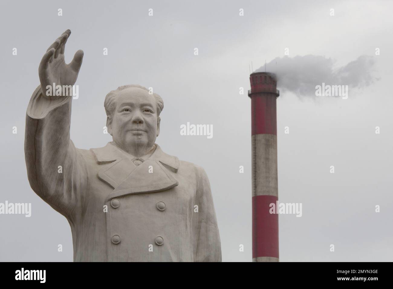 In this photo taken Monday, May 2, 2016, an enormous statue of Mao ...