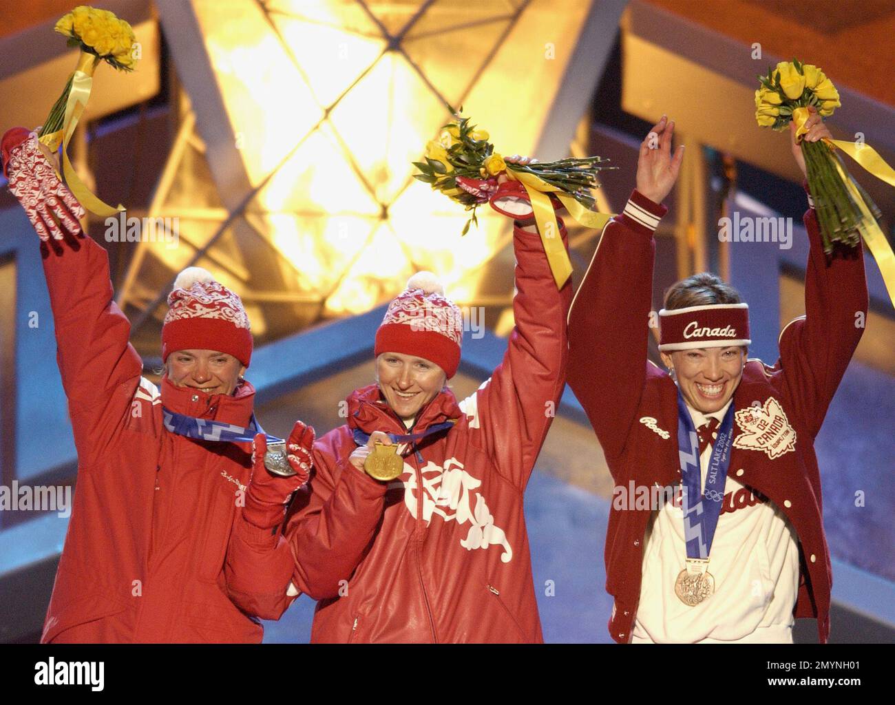 FILE - In this Feb. 15, 2002, file photo, the three Olympic medalists ...