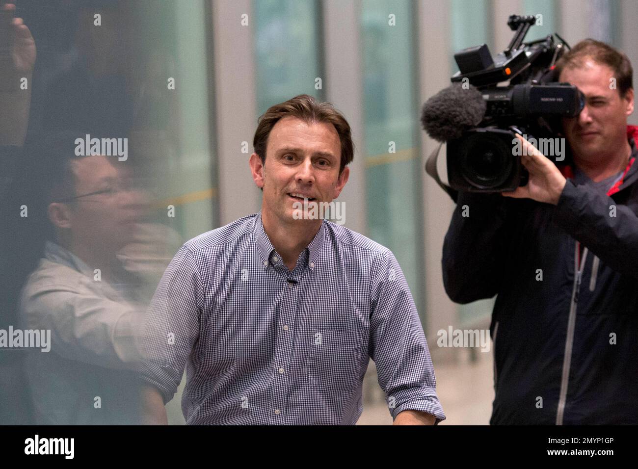 BBC's journalist Rupert Wingfield-Hayes arrives at the airport in ...
