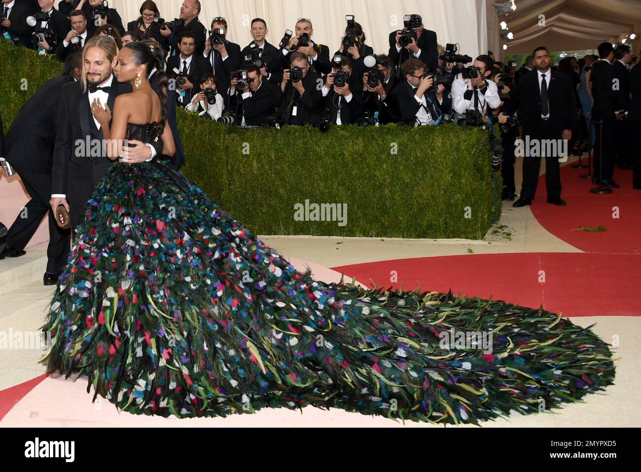 Marco Perego, left, and Zoe Saldana arrive at The Metropolitan Museum ...