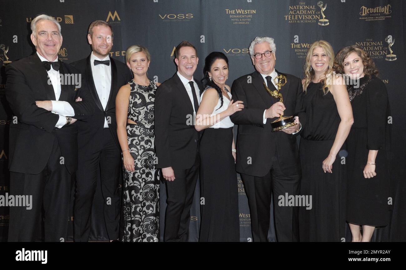 Gordon Elliott, left, and cast and crew of “The Chew” pose in the ...