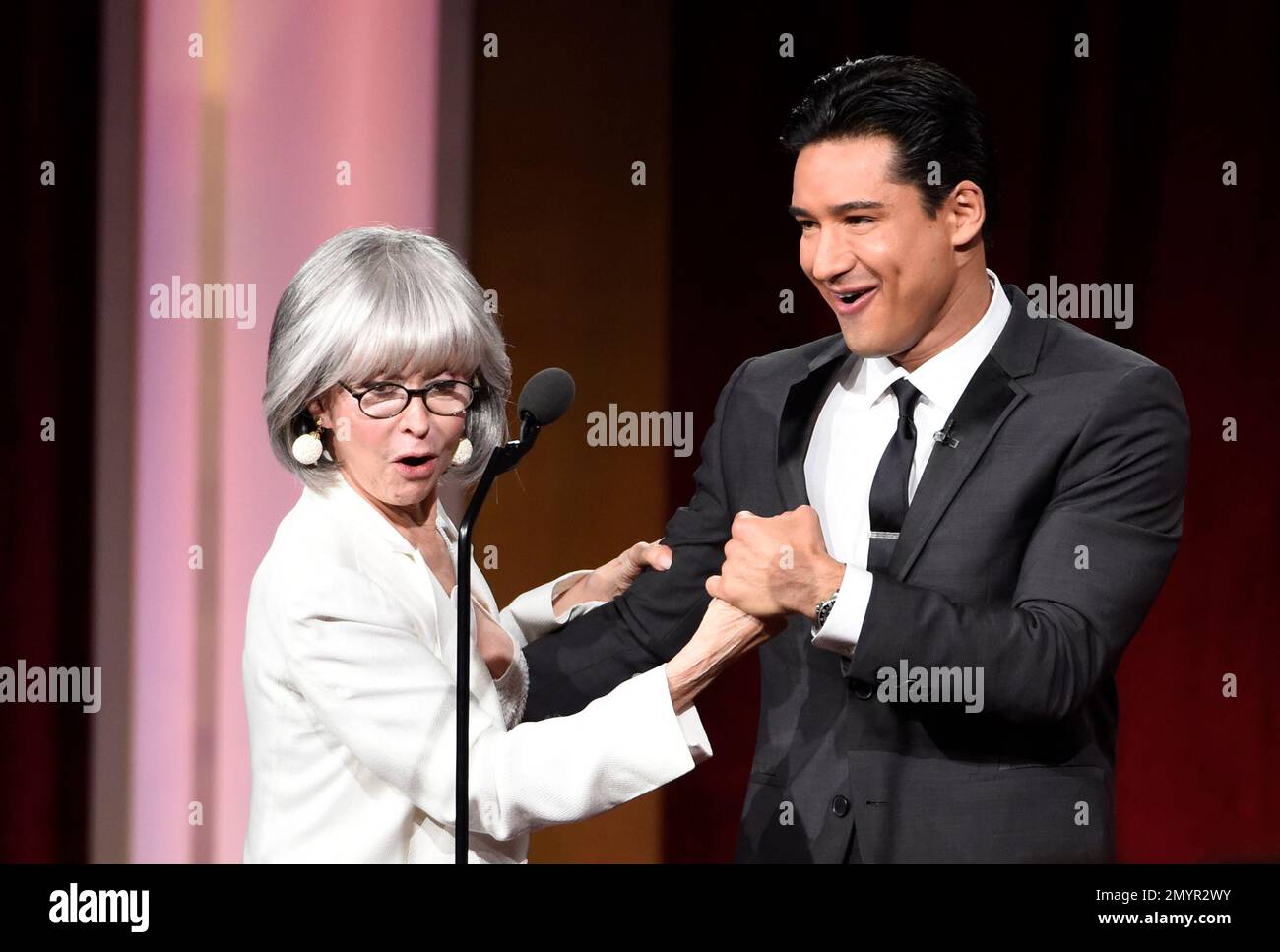Rita Moreno, left, and Mario Lopez present the Lifetime Achievement ...