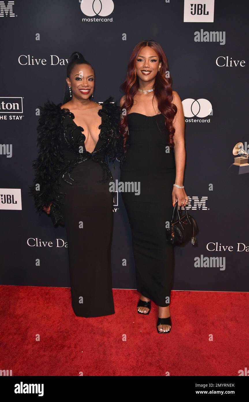 Kandi Burruss, left, and Riley Burrussarrive at the Pre-Grammy Gala on ...