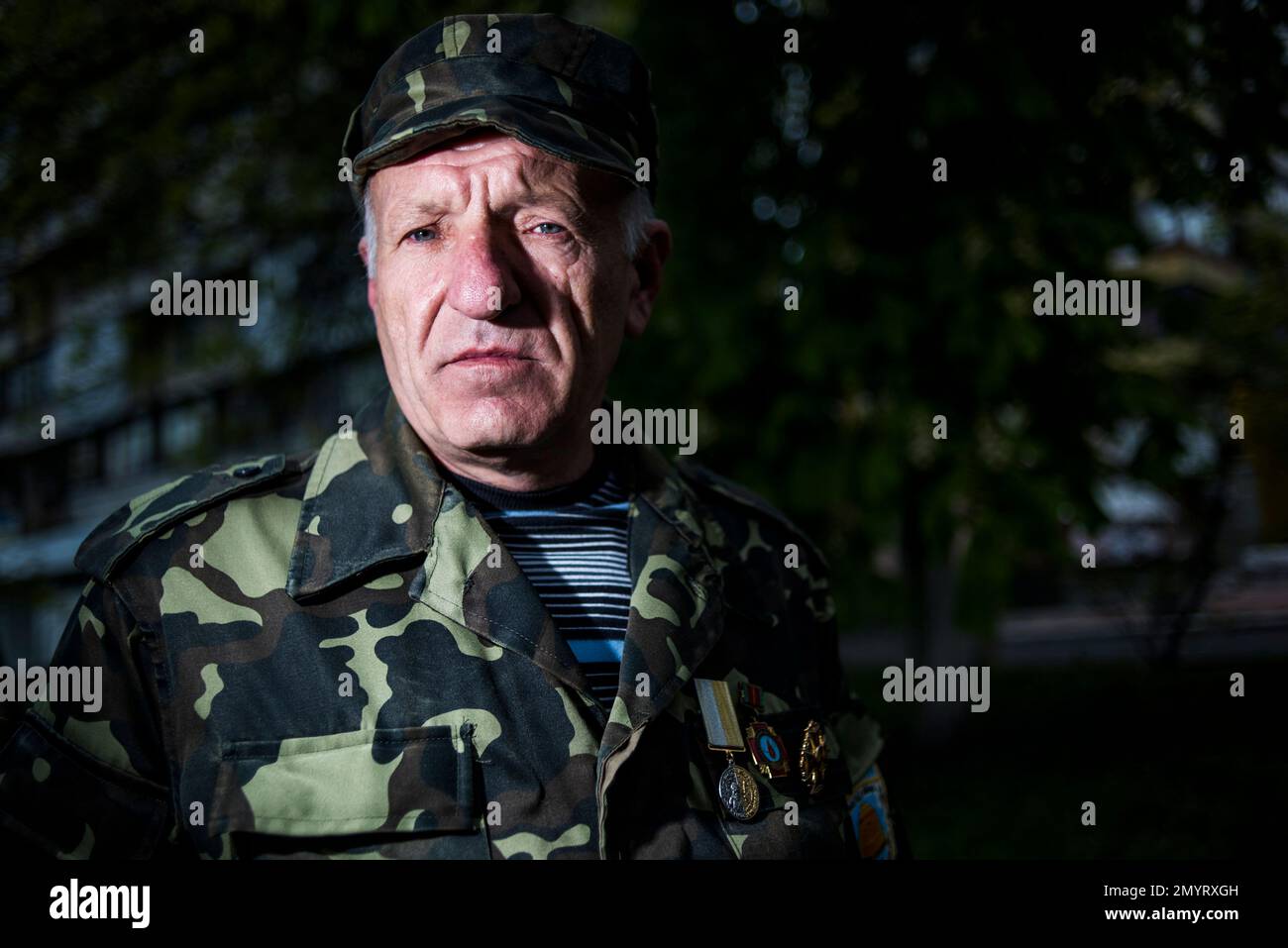 Dmitry Mikhailov, 56-year-old liquidator, poses for photo during a commemorating ceremony at the ...