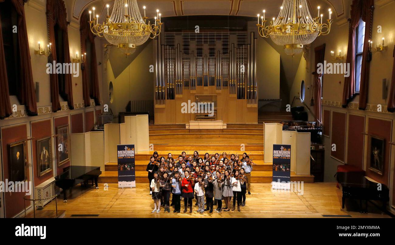 43 violin prodigies, between the ages of 11 and 21, pose for a ...