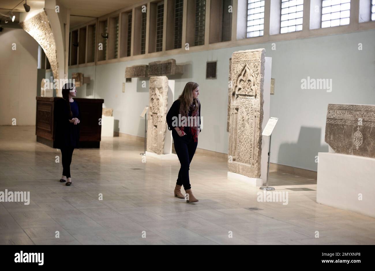 In this Sunday, March 13, 2016 photo, two women visit the Islamic Hall ...
