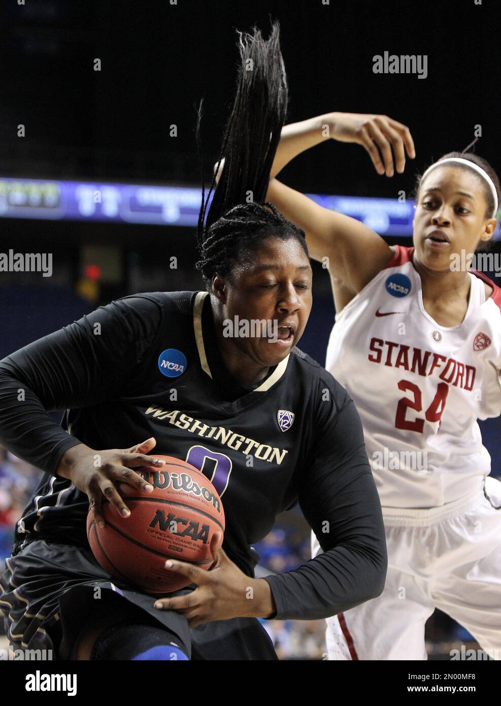 Washington's Chantel Osahor, left, pulls down a rebound near Stanford's ...