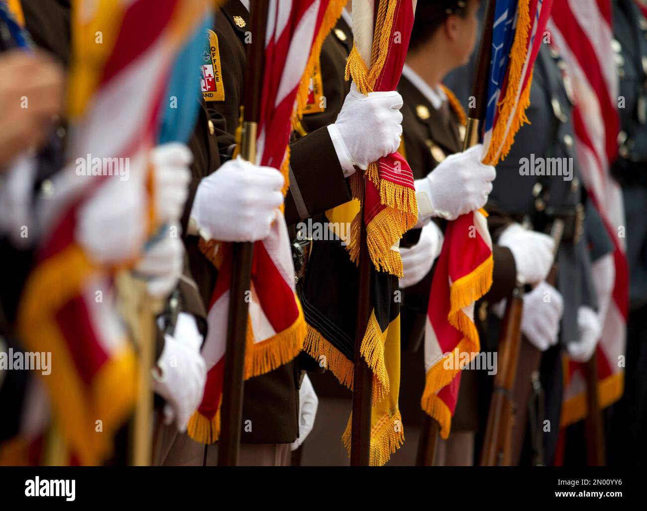 A Maryland police honor guard stand at attention before the arrival of ...