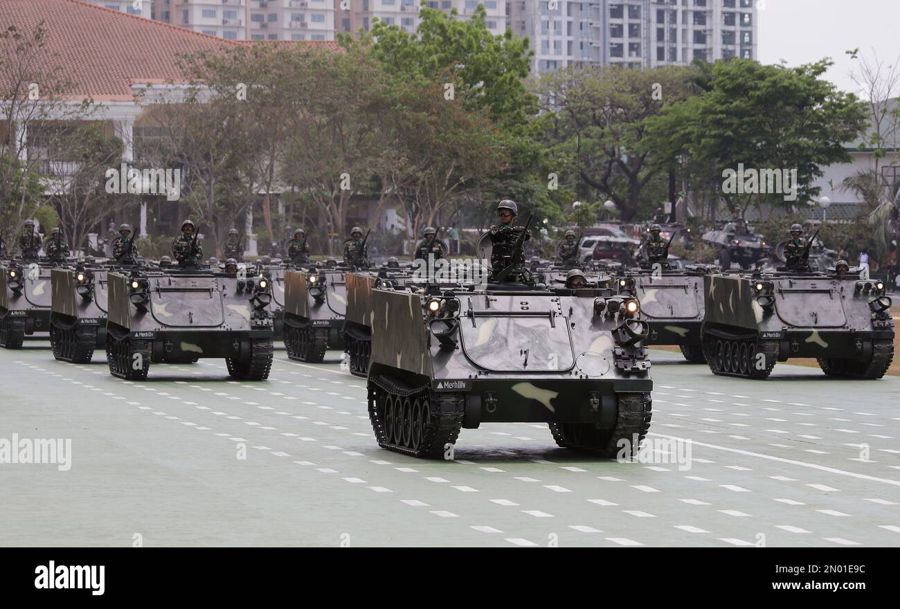 Filipino troopers ride on Armored Personnel Carriers during ceremonies ...