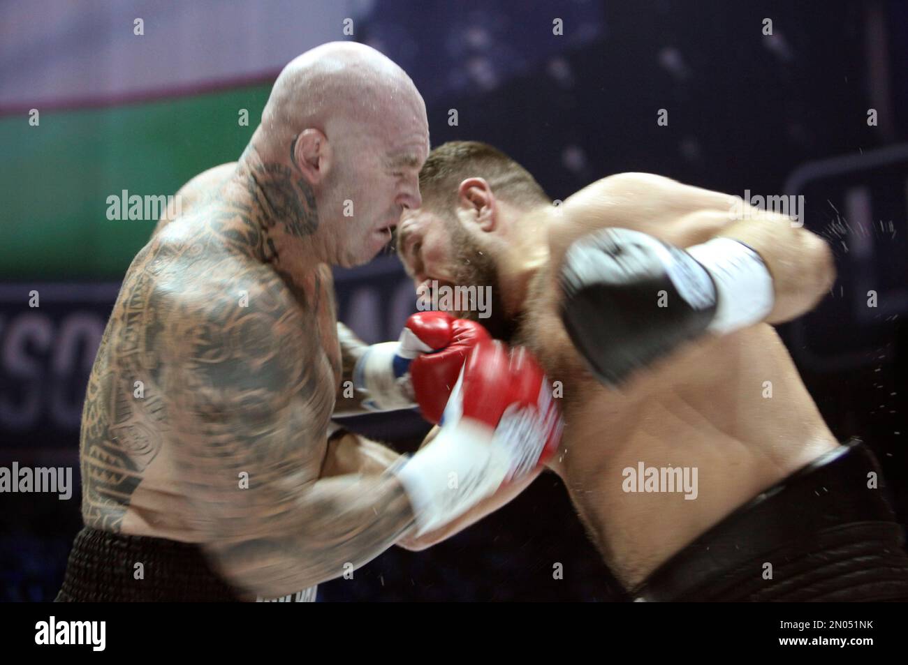 Australia's Lucas Browne, left, hits Uzbekistan's Ruslan Chagaev during ...