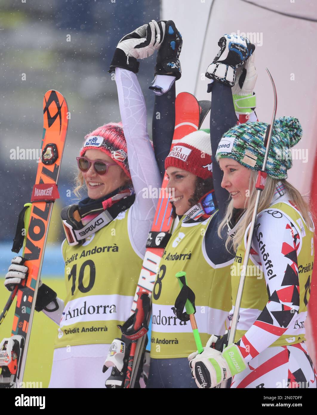 Italy's Federica Brignone, center, the winner, is flanked on podium by ...