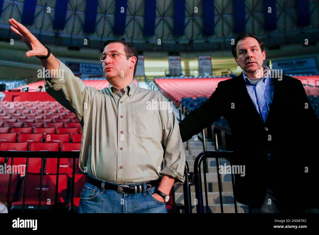Sen. Ted Cruz, R-Texas, left, accompanied by his communications ...