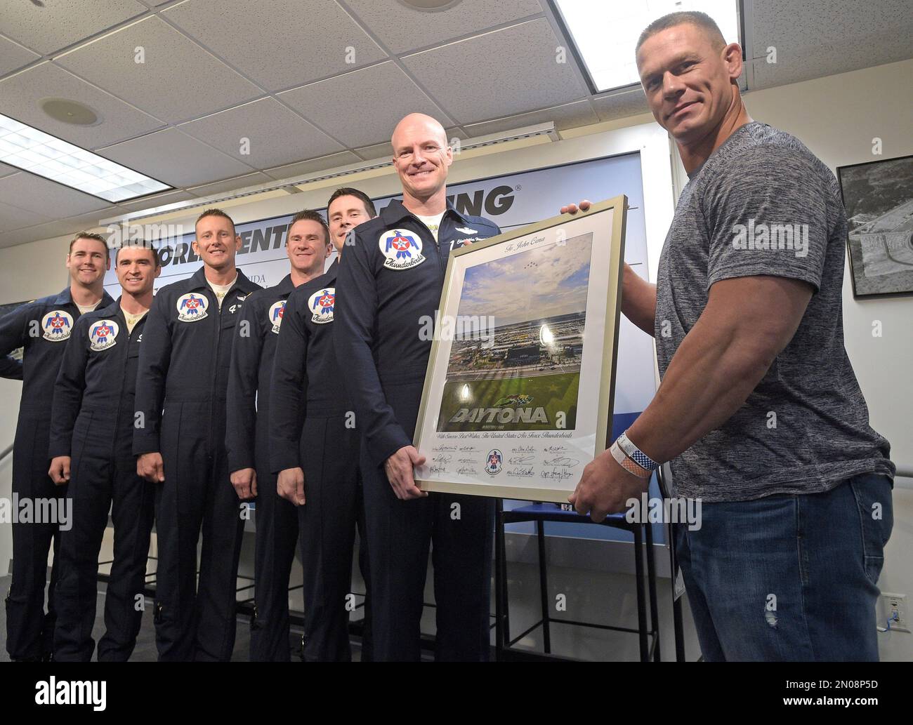 Professional wrestler John Cena, far right, poses with U.S. Air Force ...