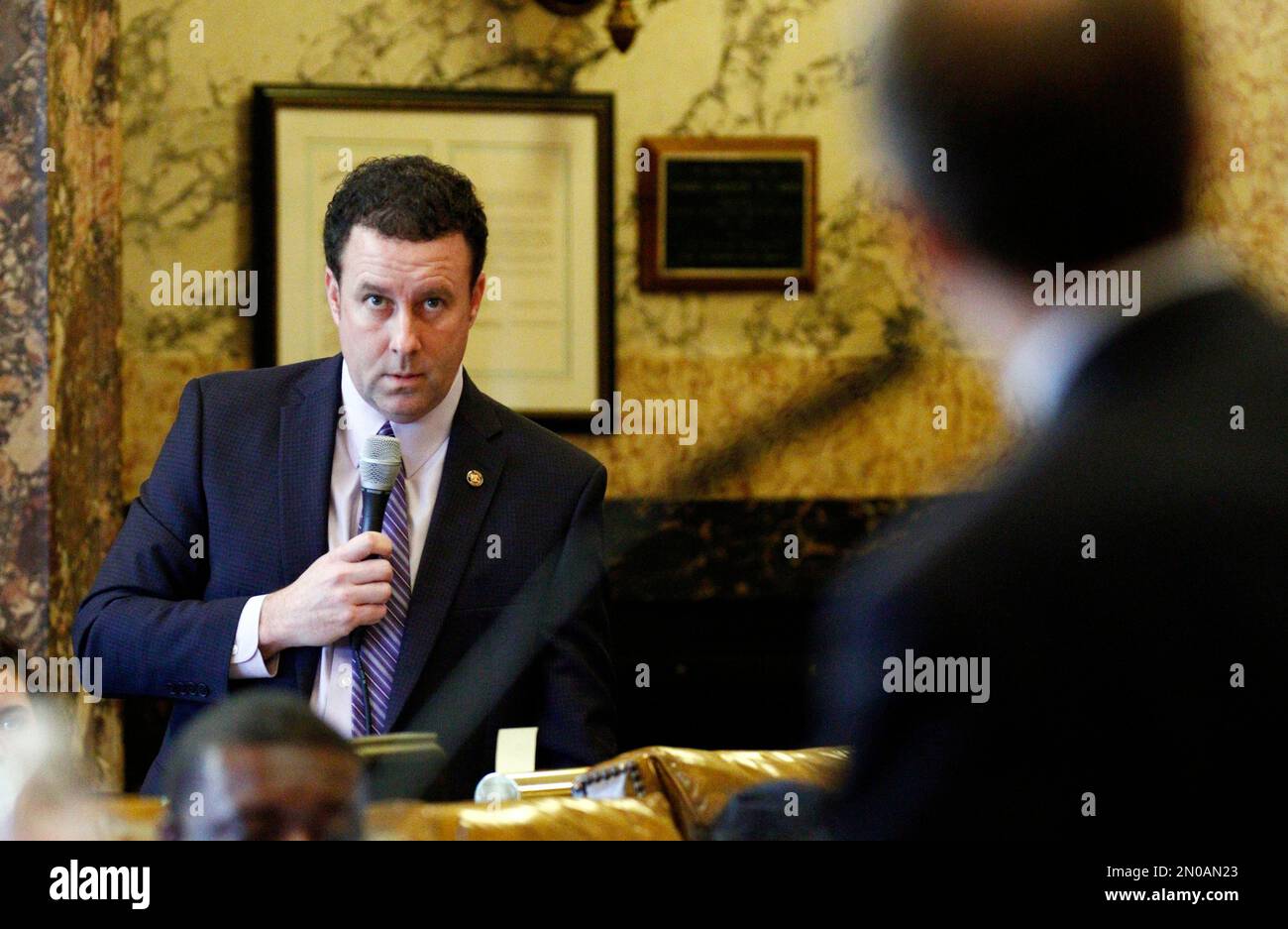Sen. David Parker, R-Olive Branch, left, listens as Senate Education ...