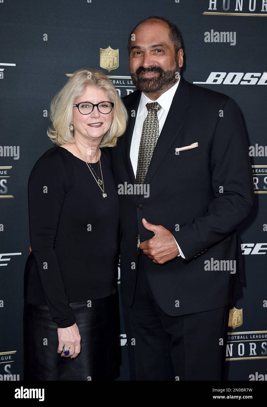 Former NFL player Franco Harris, left, and Dana Dokmanovich arrive at ...