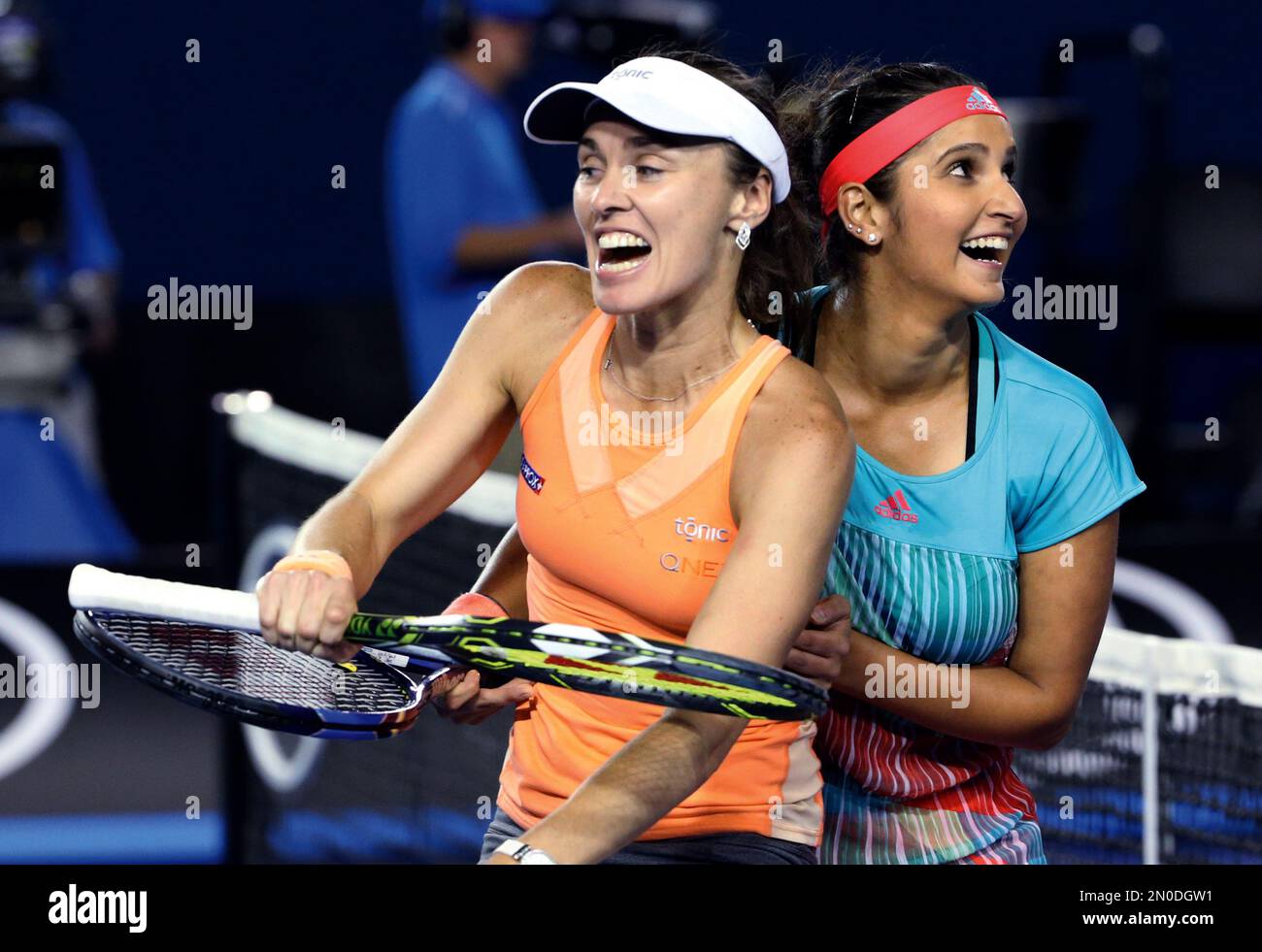 Sania Mirza, right, of India embraces her partner Martina Hingis of ...