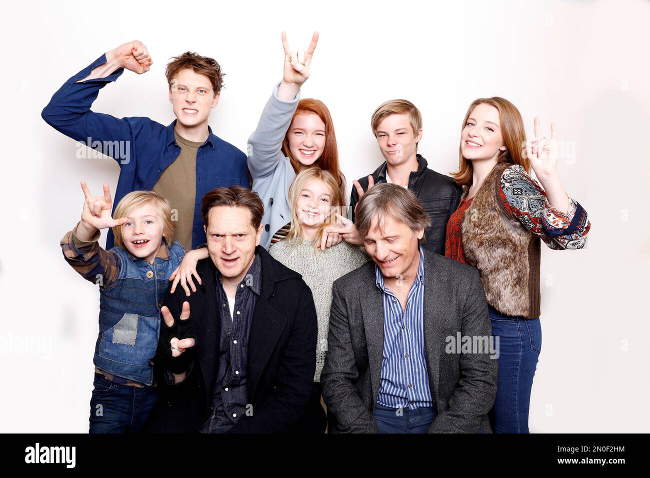 Director and actor Matt Ross, front left, poses with actors, from back ...