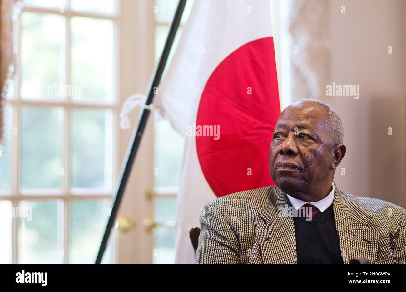 Hank Aaron looks on during a ceremony presenting him the Order of the ...