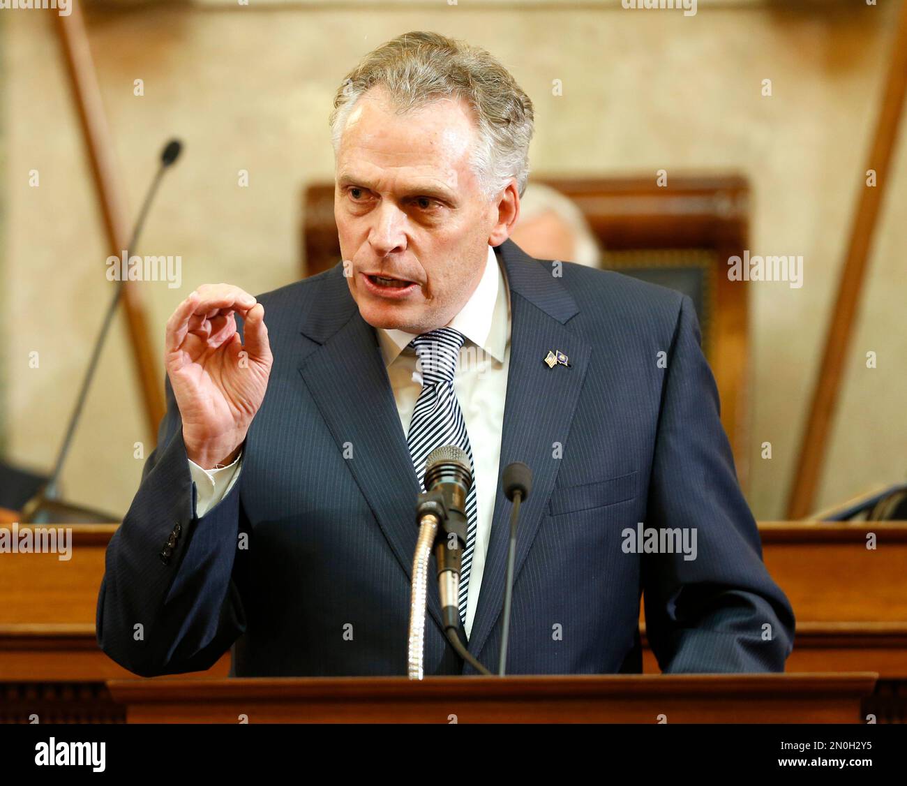 Virginia Gov. Terry McAuliffe gestures as he delivers his State of the ...