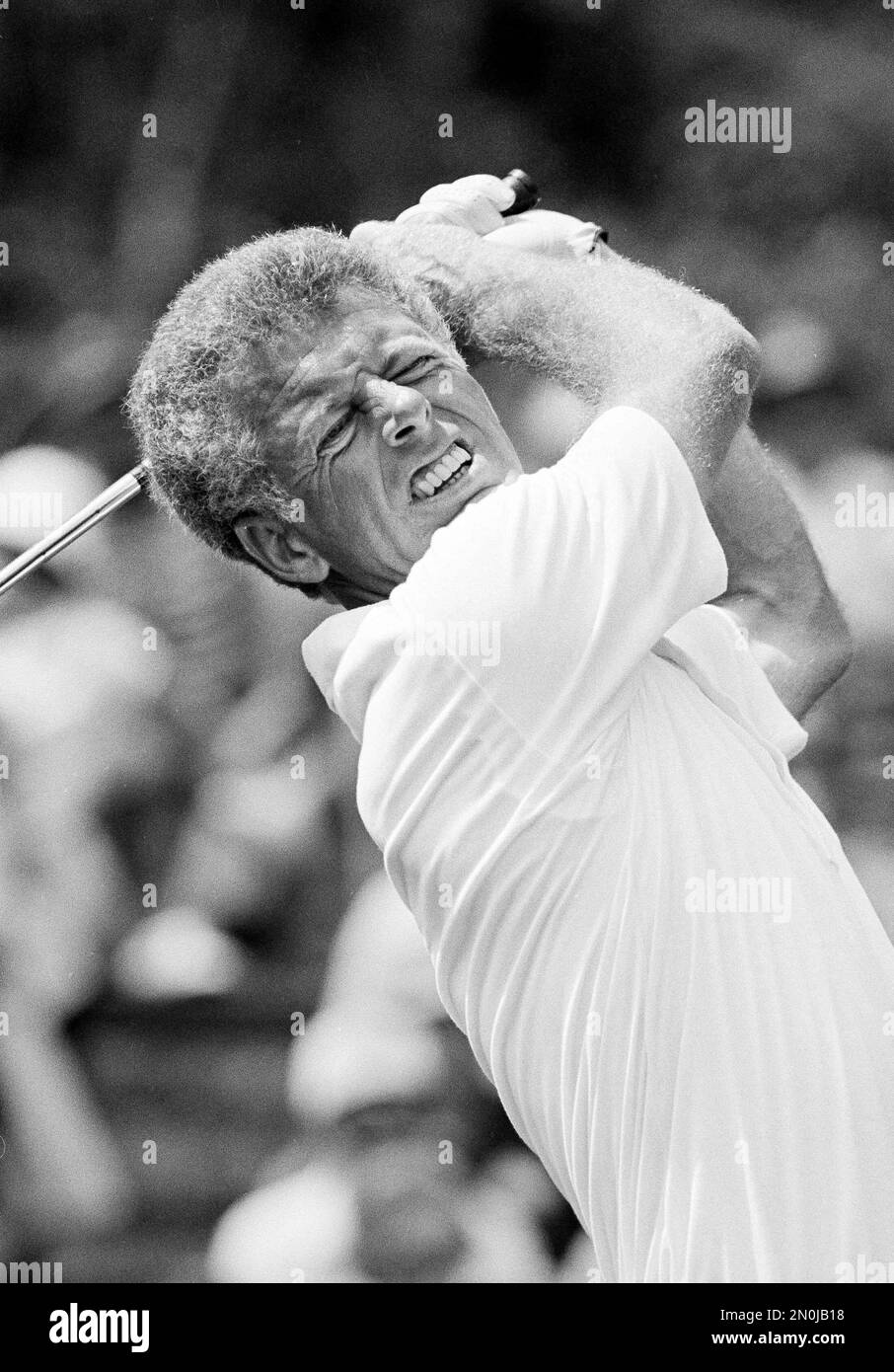 John Schlee of Rancho Viejo, Texas, keeps his eyes on the ball as he ...