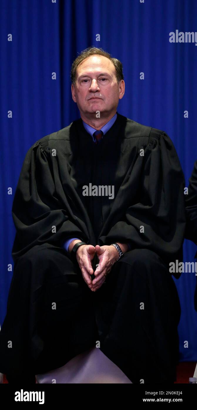 U.S. Supreme Court Justice Samuel Alito sits on stage before ...