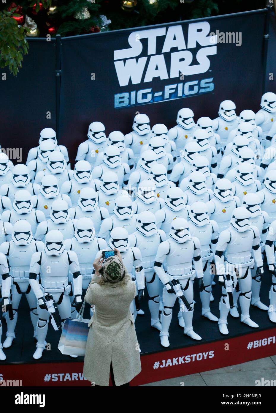 A woman photographs over 100 JAKKS BIG-FIGS Stormtrooper action figures ...