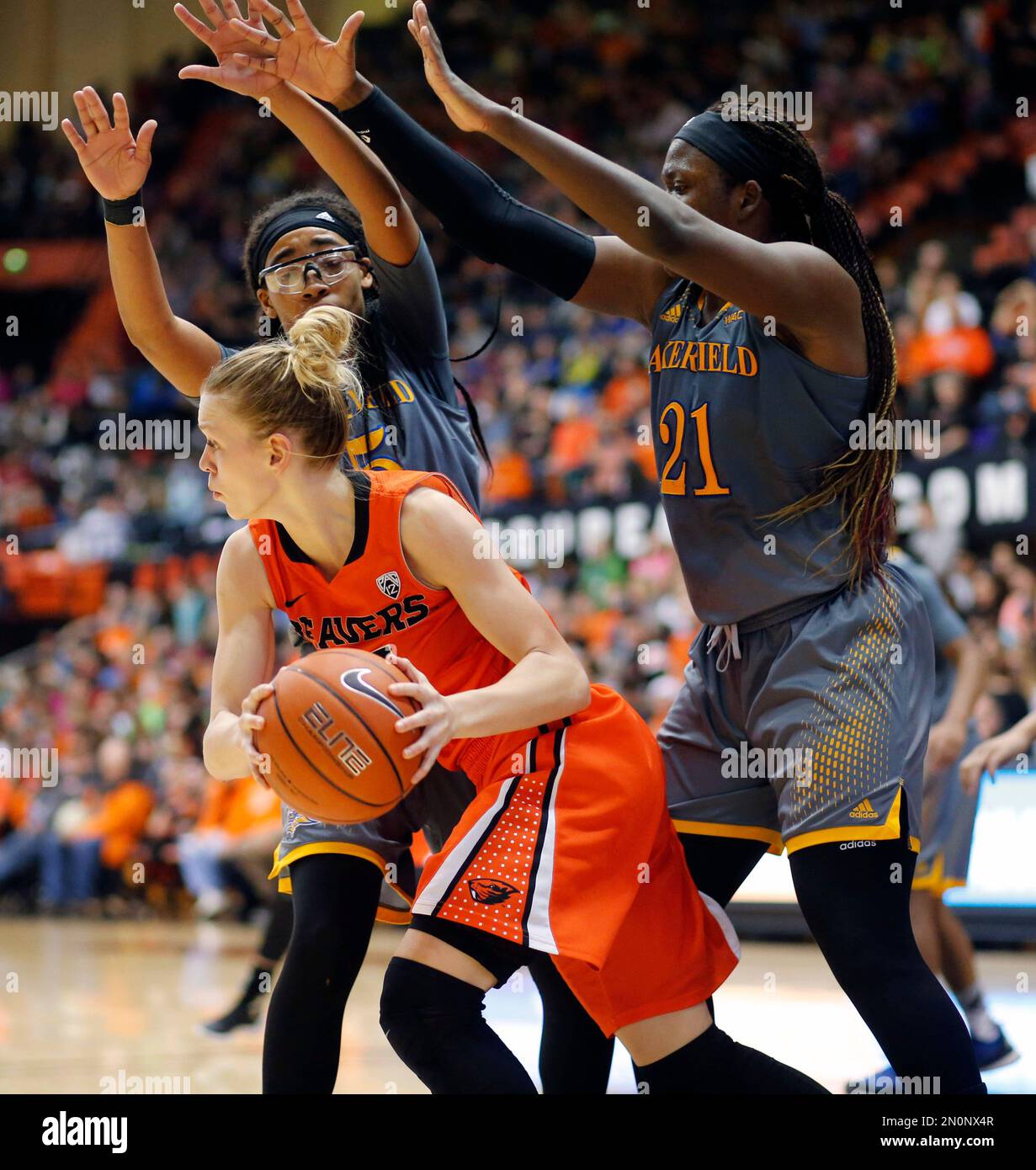Oregon State's Jamie Weisner, left, is blocked by CSU Bakersfield's ...