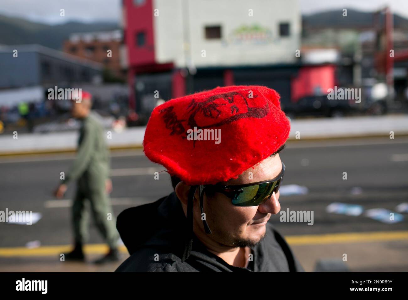 FILE - In this Dec. 6, 2015 file photo, a supporter of Venezuela's late ...