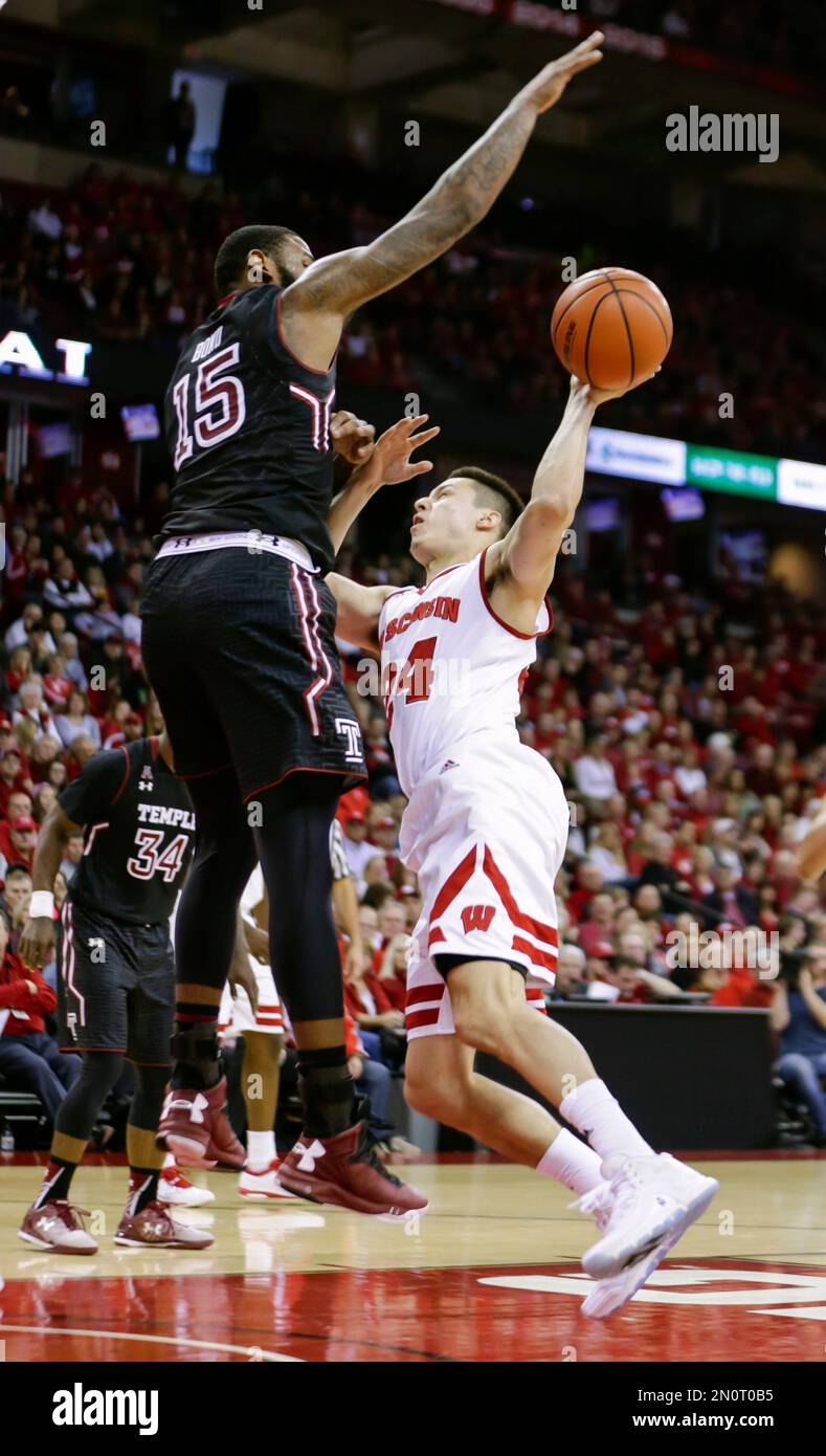 Temple's Jaylen Bond (15) fouls Wisconsin's Bronson Koenig (24) during ...