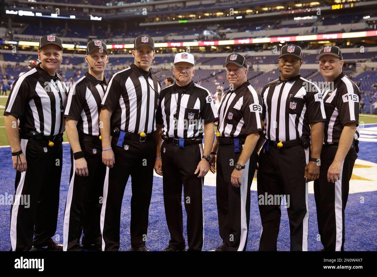 Head linesman Jerry Bergman (91), back judge Rich Martinez (39), field ...
