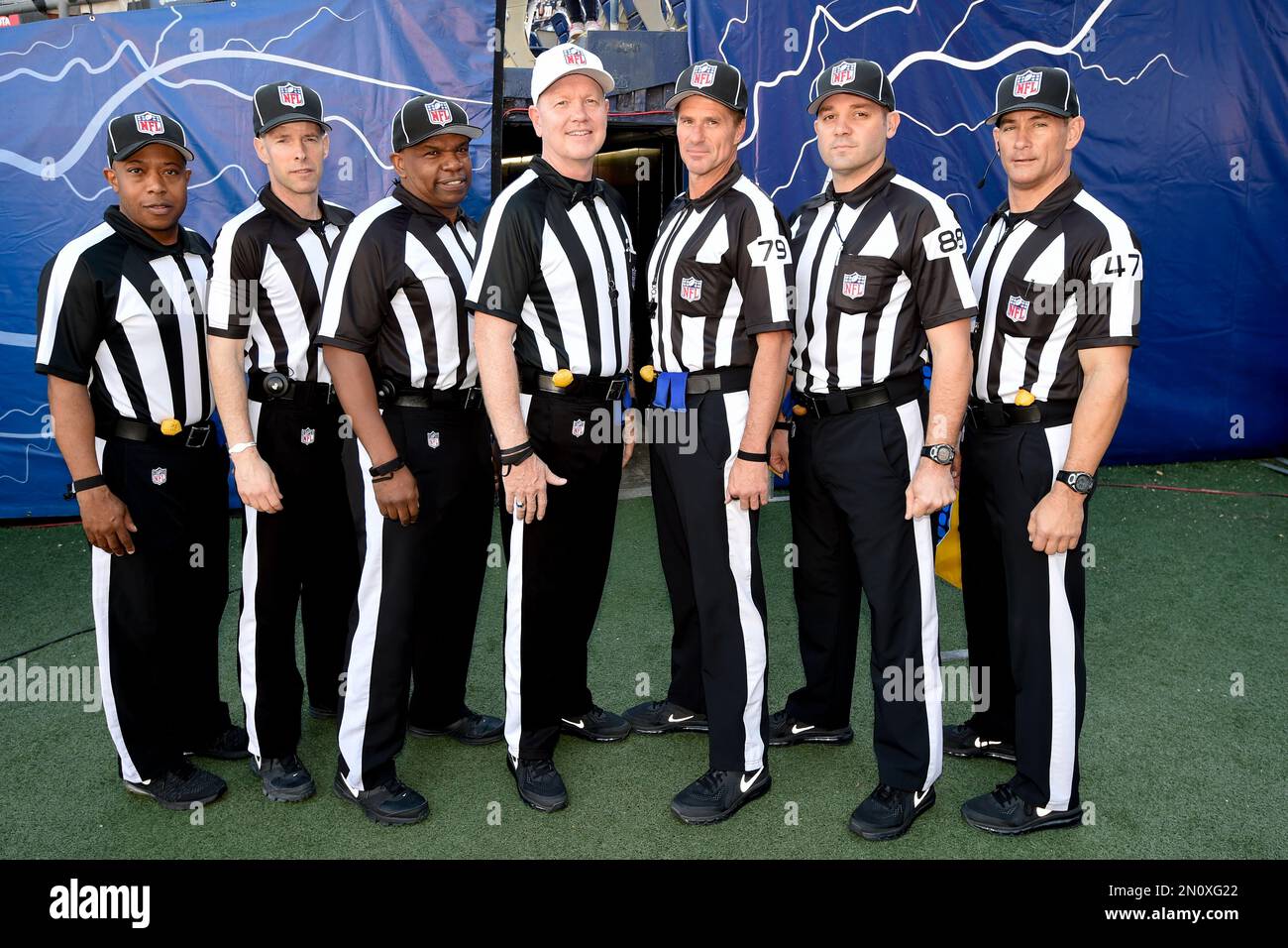 Officials pose before an NFL football game between the San Diego ...