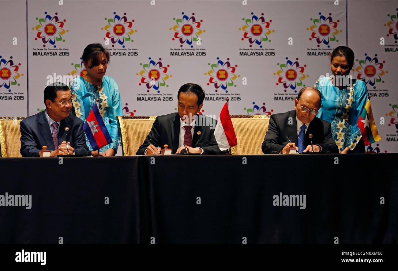 Indonesia's Prime Minister Joko Widodo, center, and Myanmar's President ...