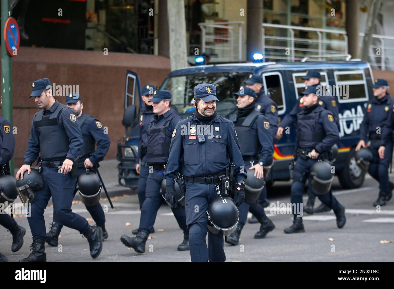 Police officers walk to take position outside Real Madrid's Santiago ...
